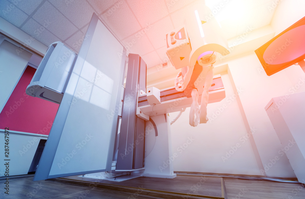 X-ray room in a hospital. Classic ceiling-mounted x-ray system. Stock ...