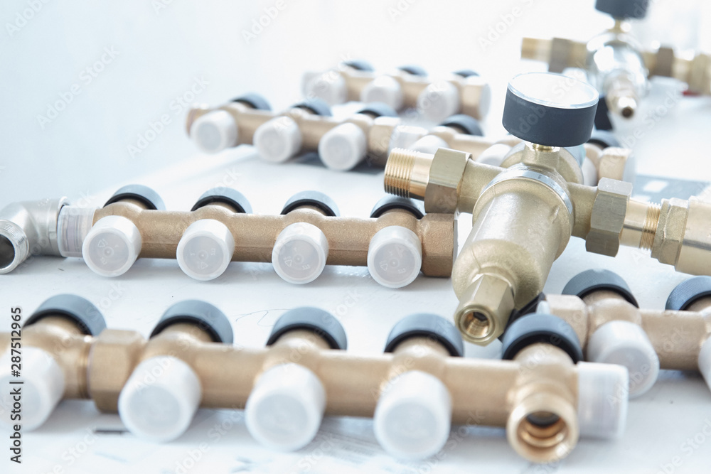 Elements of water conduit and manometers in room Stock Photo | Adobe Stock