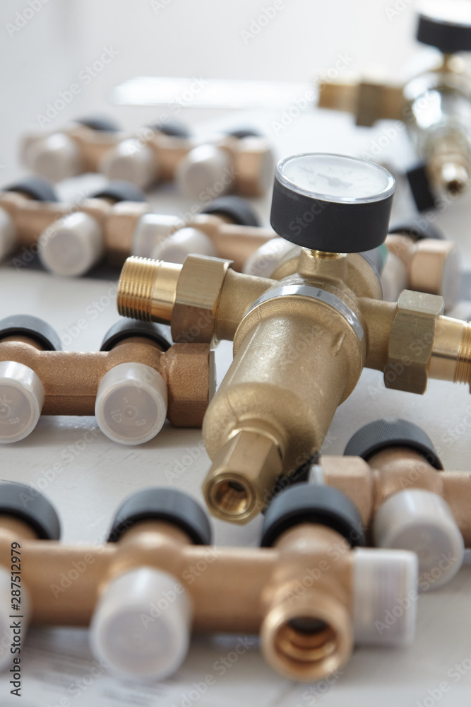 Elements of water conduit and manometers in room Stock Photo | Adobe Stock