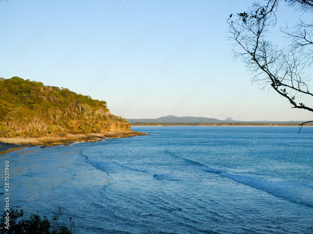 Early morning sunrise natural light on the rainforest and cliffs at Tea ...