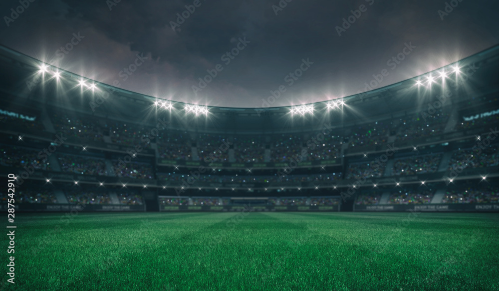 Empty green grass field and alight outdoor stadium with fans, front ...