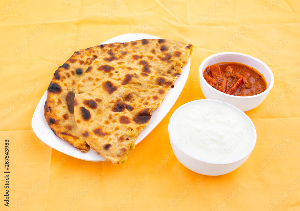Indian Traditional Breakfast Dish Aloo Paratha is a Potato Stuffed ...