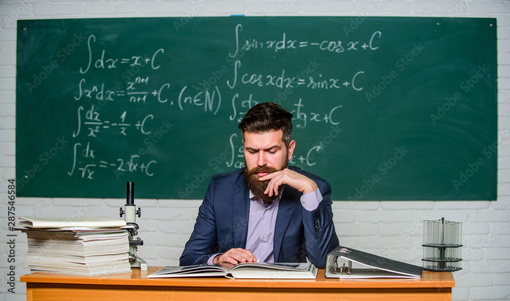 Prepare for lesson. Teacher strict serious bearded man chalkboard ...