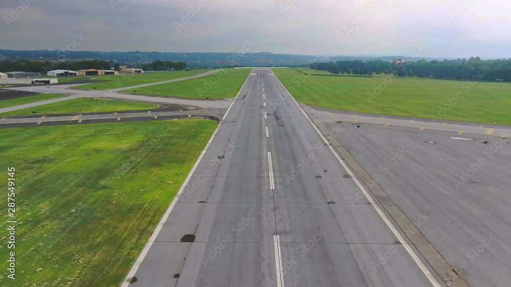 Stockvideon Flying above the runway of small regional airport, pilots ...