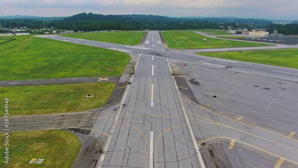 High speed low pass above runway, pilots perspective, aerial view of ...