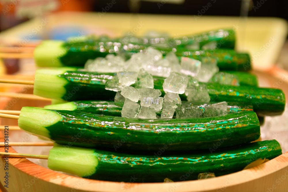 Cucumbers on stick in ice sold at the Nishiki Market in Kyoto, Japan ...