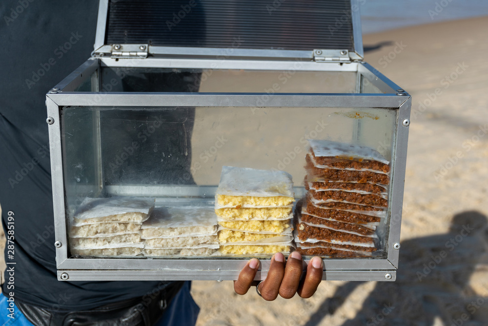 Various types of coconut candy, traditional, passion fruit and toasted ...