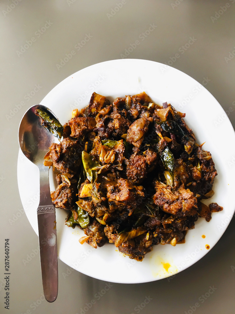 Beef coconut fry. Famous South Indian food, (Kerala's famous) food ...