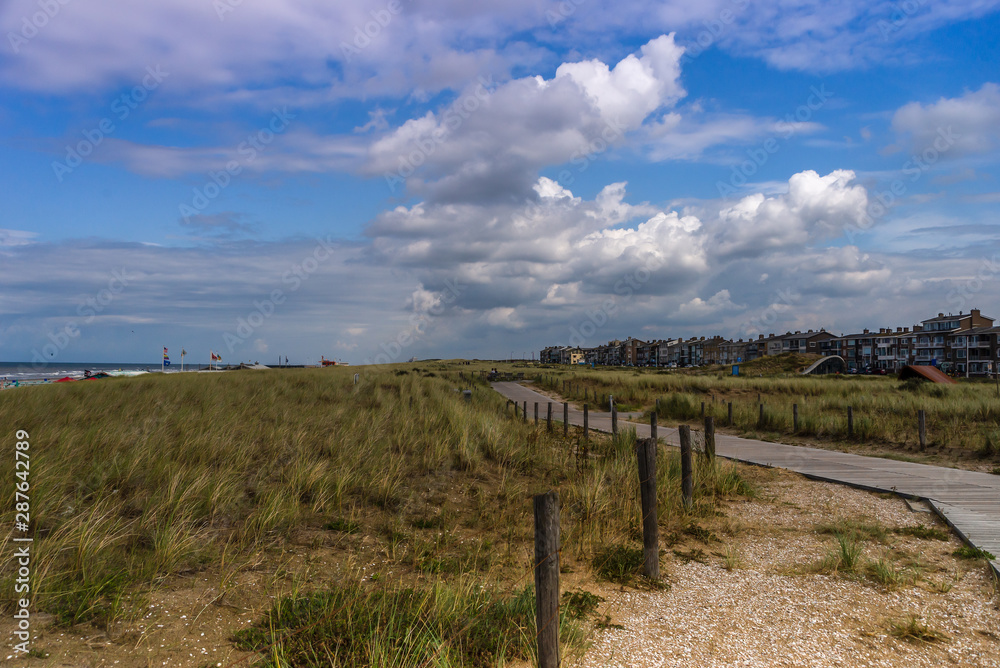 Image of the beautiful city, dikes and sandy beaches on the shores of ...