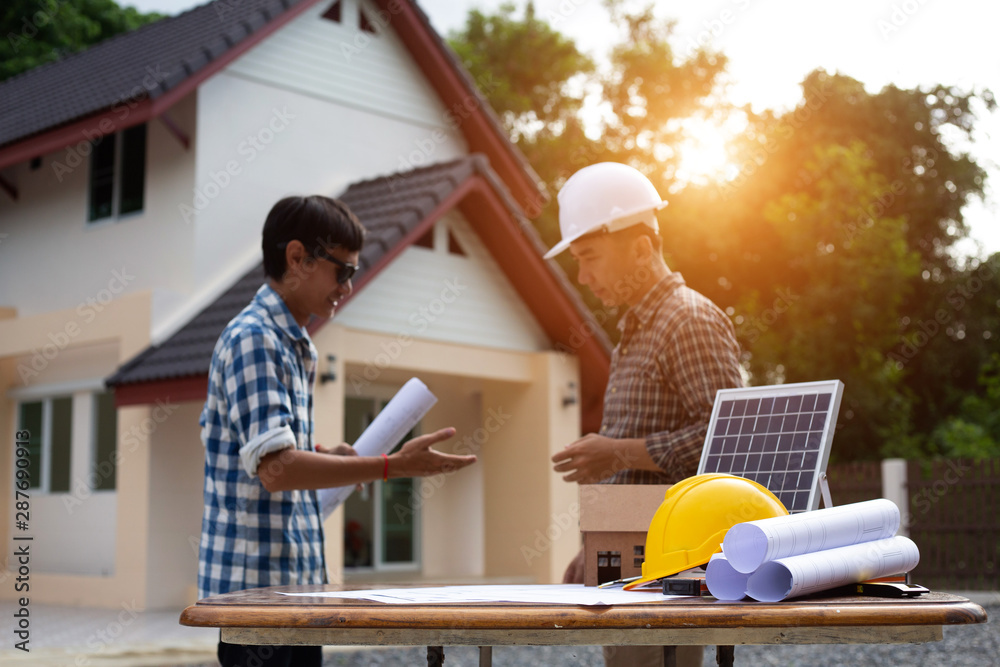 Team Engineers are writing solar panel for home construction designs to ...