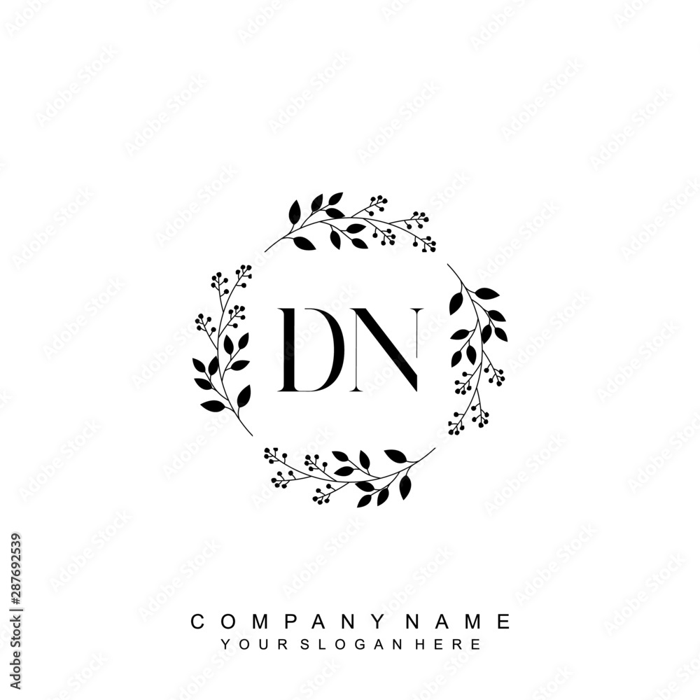 letter DN surrounded by beautiful and elegant flowers and leaves ...