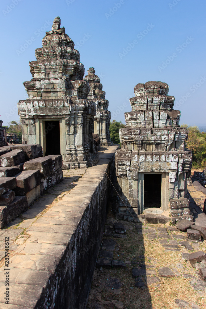 Ruins of old Phnom Bakheng Temple in Angkor in Cambodia. The temple was ...
