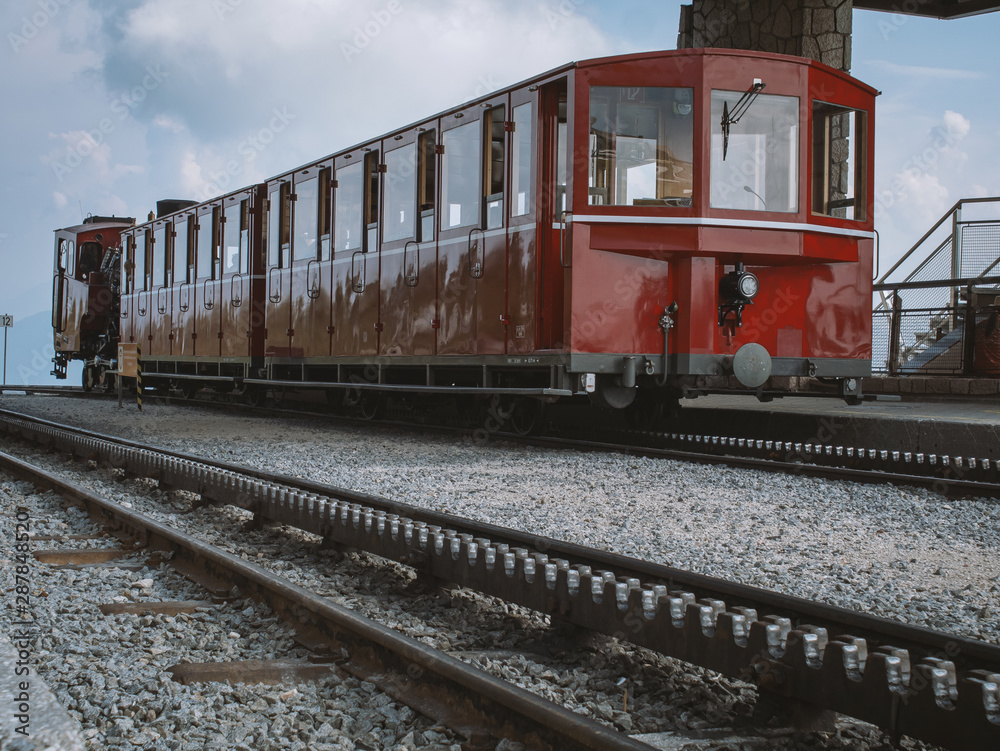 Old rack and pinion railway with pushing steam locomotive in Austria ...