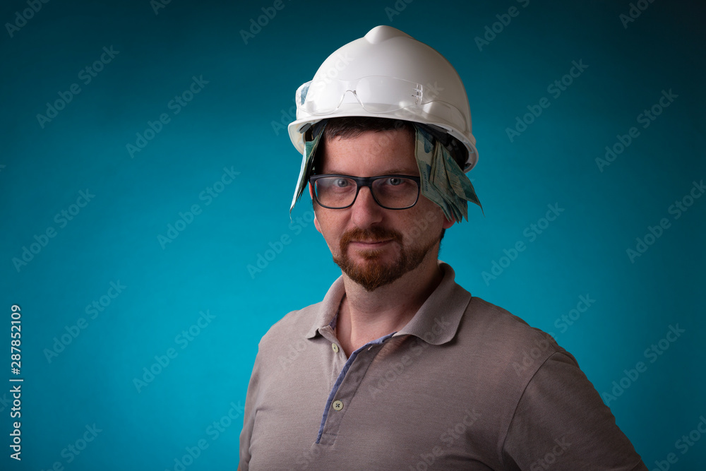 Construction worker with normal glasses, transparent protective glasses ...