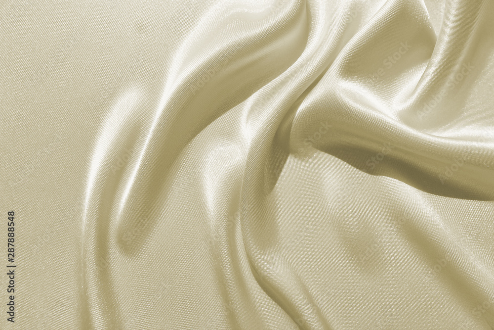 Delicate satin draped fabric beige texture for a celebratory ...