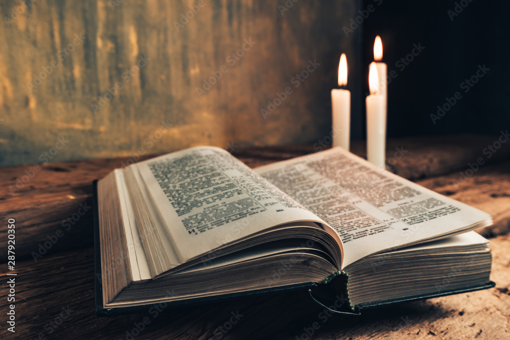 Open Bible With Candle