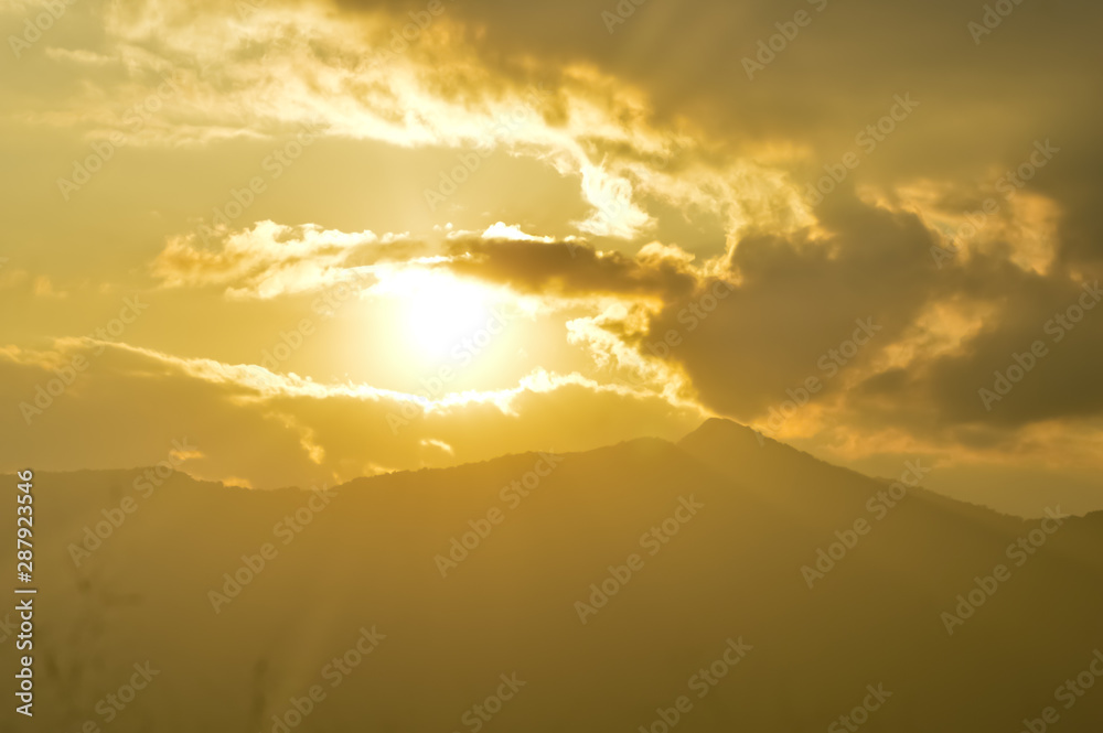 Dramatic dark heavily Red sunset clouds makes the sky romantic on one ...