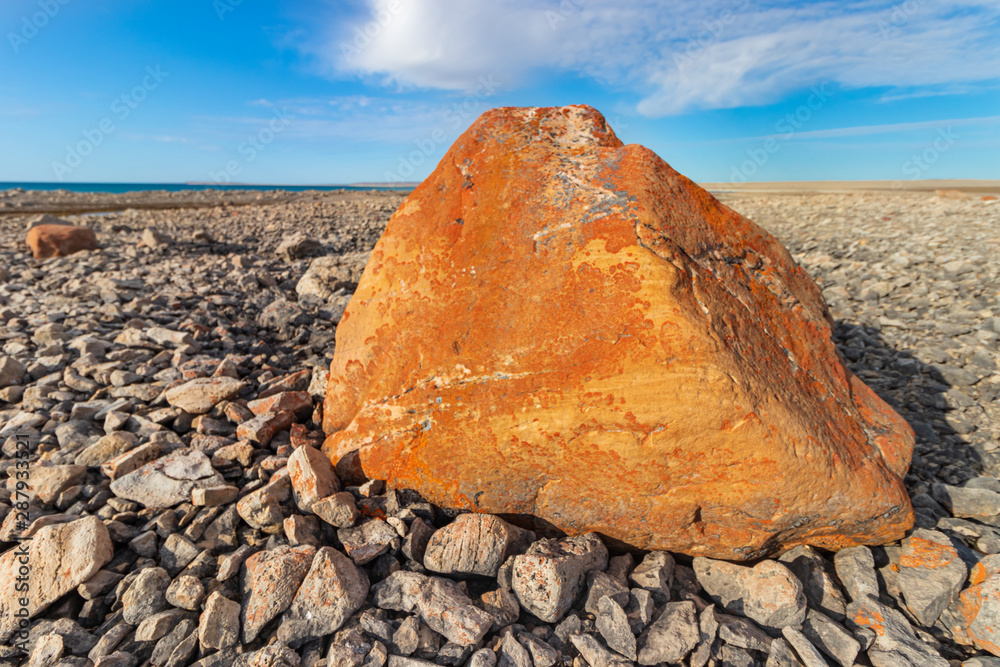 Rocks and stones in the beach of Lady Richardson Bay at the southwest ...