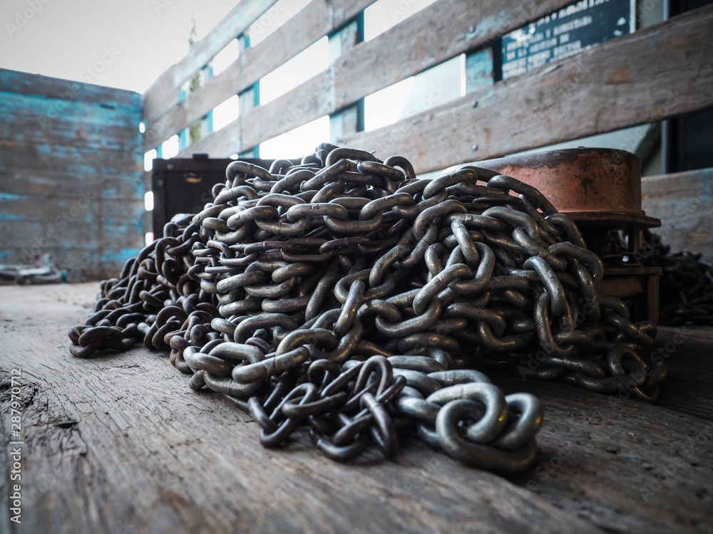 Pile of chains and a chainblock in the back of a flatbed truck. Stock ...