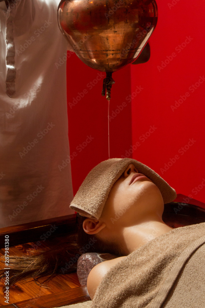 Shirodhara An Ayurvedic Healing Technique Oil Dripping On The Female