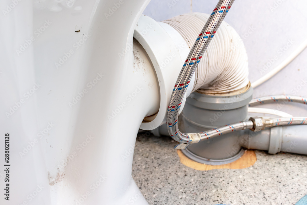 Plastic corrugated pan pipe and water supply fitting for the toilet ...