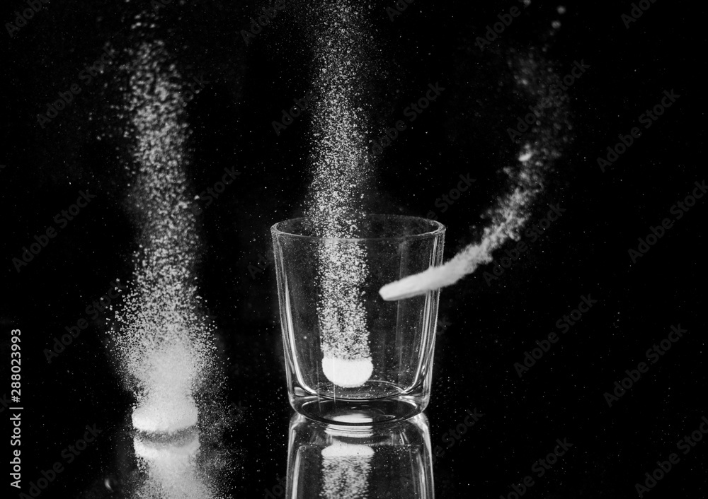 effervescent tablet dissolving in water Stock Photo | Adobe Stock