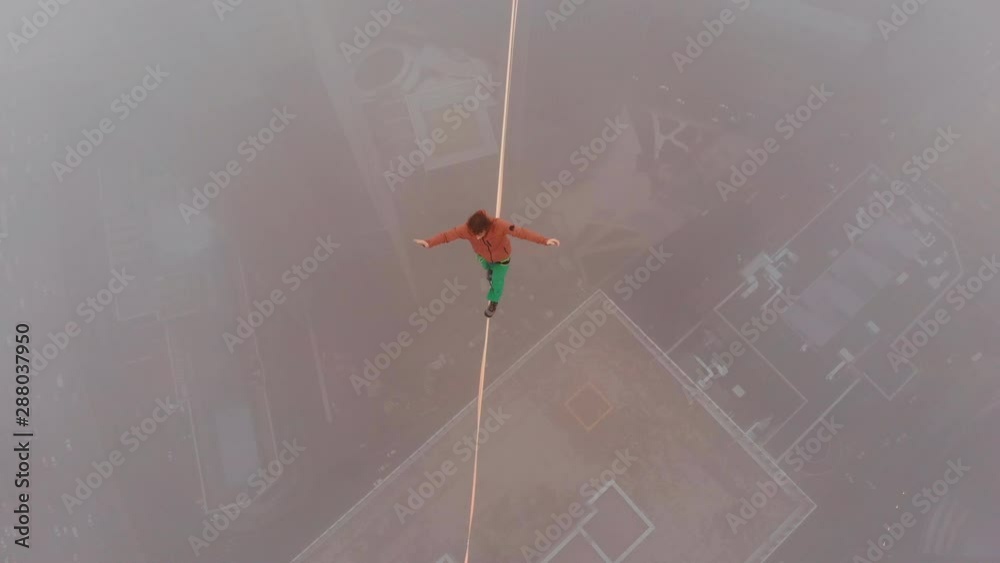 Slackline world record in Moscow, Guinness world record. A man balances ...