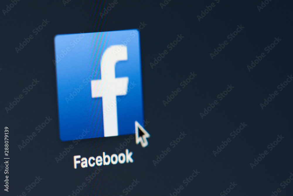 Facebook icon on screen Stock Photo | Adobe Stock