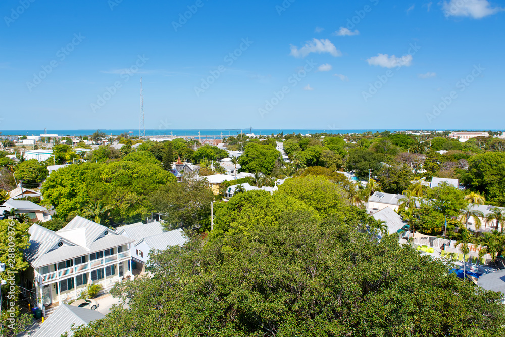 The historic and popular center and Duval Street in downtown Key West ...