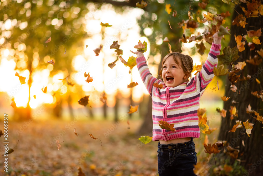 Happiness of little girl child in the month of fall Stock Photo | Adobe ...