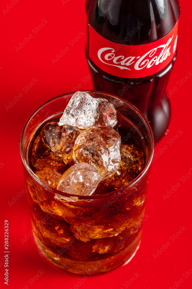 MINSK, BELARUS - APRIL 14, 2018: Classic bottle of Coca-Cola and glass ...