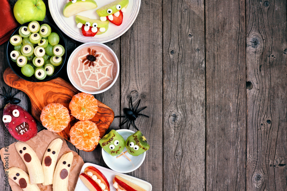 Healthy Halloween fruit snacks. Assortment of fun, spooky treats. Top ...