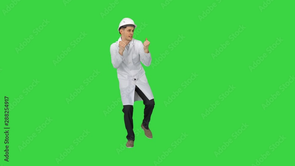 Engineer man dancing hip-hop in funny way on a Green Screen, Chroma Key ...