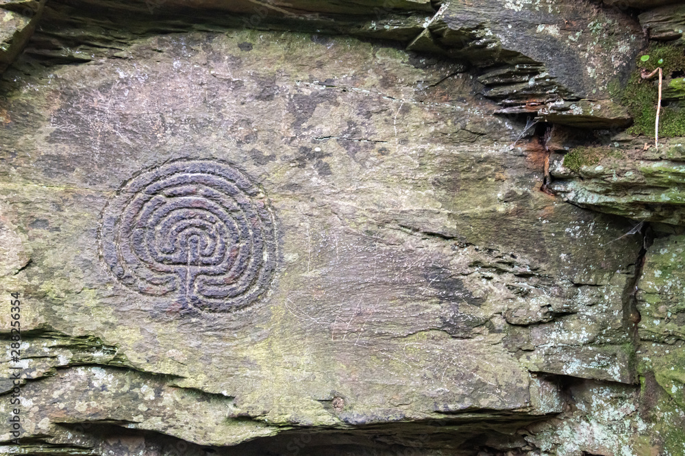 Labyrinth Rock carving in Cornwall petroglyphs Stock Photo | Adobe Stock