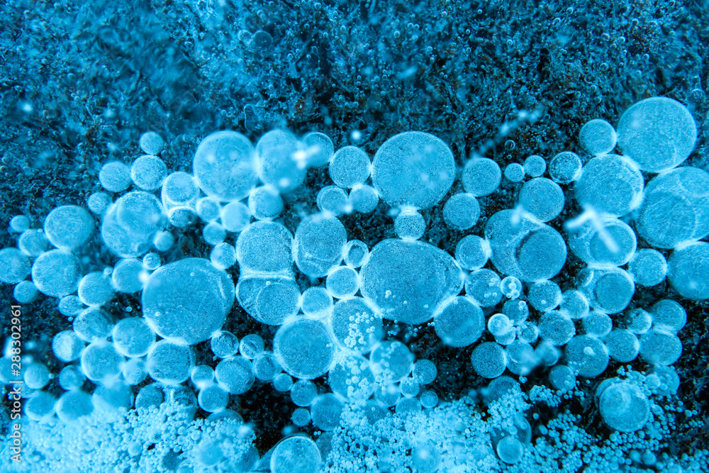 Ice background with frozen bubbles. Natural winter texture of frappe ...