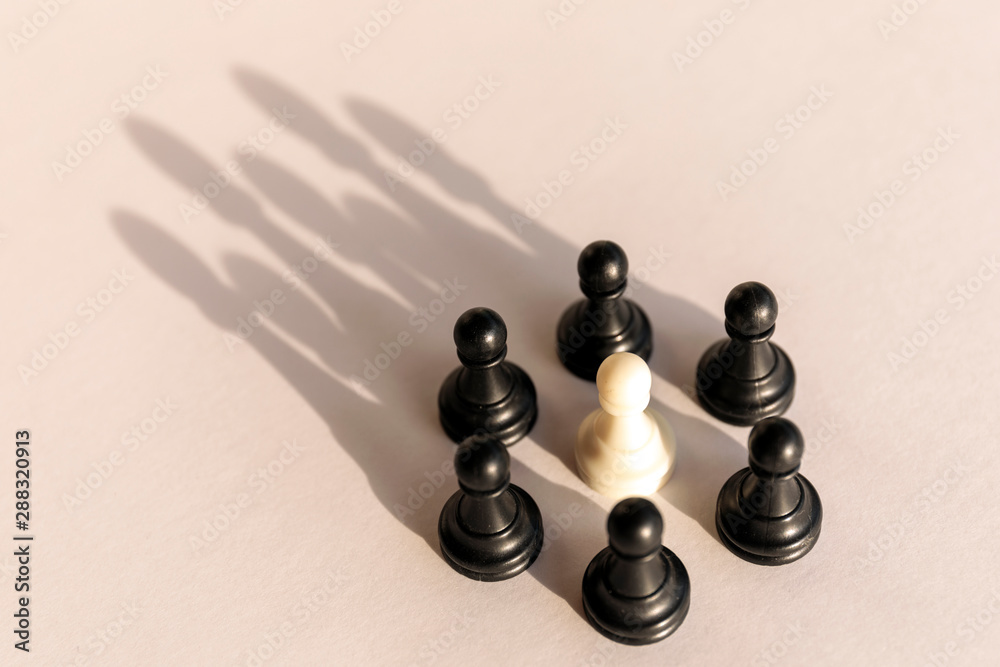 Plastic chess pawn circle with shadow shaped as crown on white ...