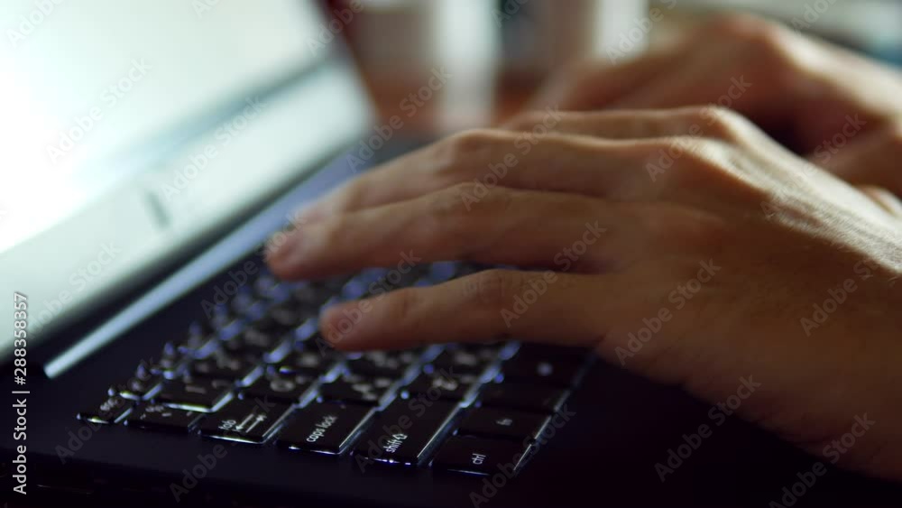 male hands type on laptop computer keyboard Stock Video | Adobe Stock
