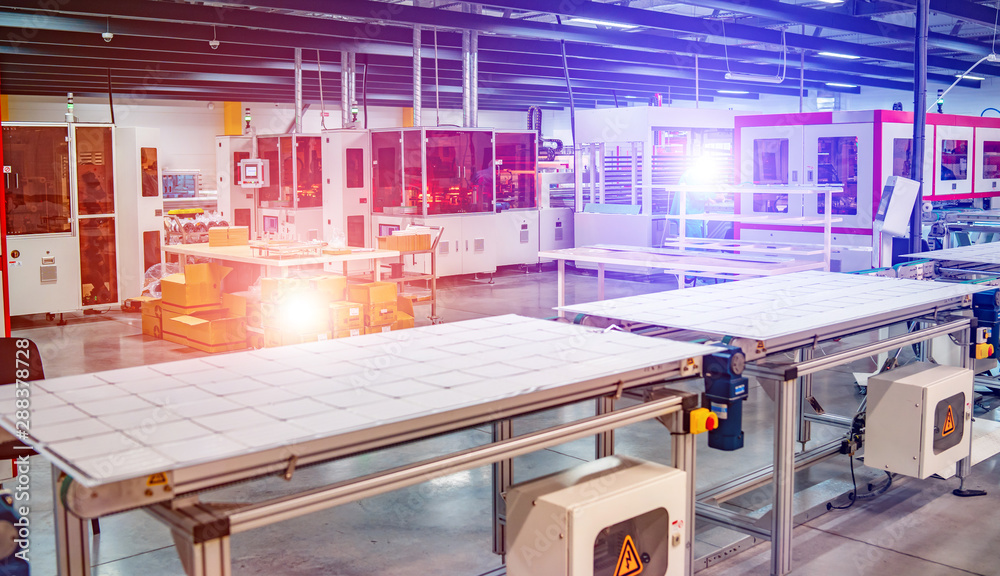 Production of solar panels. Modern industrial equipment manufacturing ...