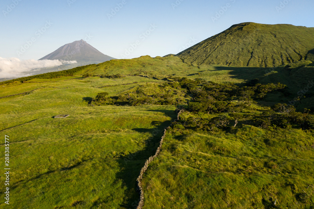 Aerial image of typical volcanic caldeira landscape with volcano cones ...