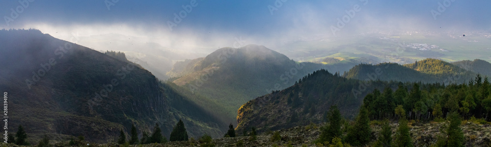 Amazing panorama landscape with a magical light and beams as seen from ...