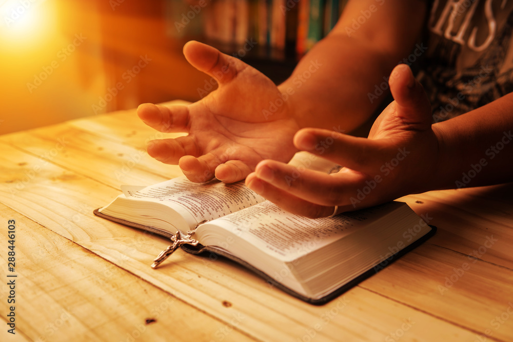 Christian hand while praying and worship for christian religion with ...