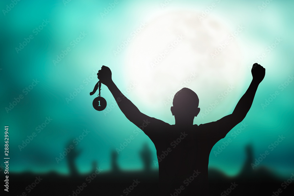 Foto de Motivated for winner concept: Silhouette champion hand raised ...