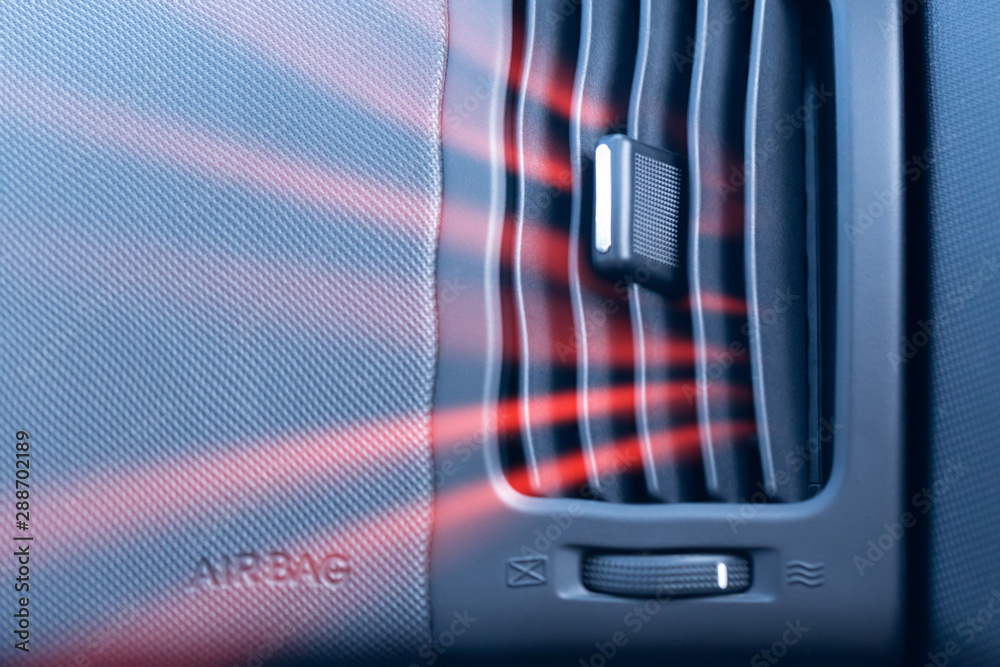 Car air conditioner with illustration of hot air flow from it. Front ...