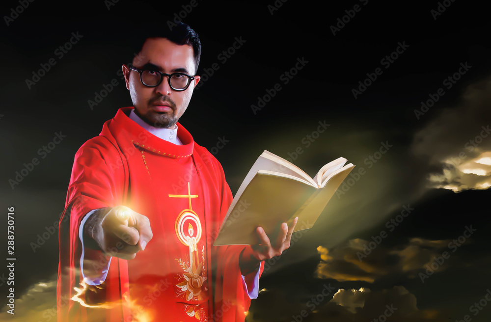 Christian pastor holding scripture with background of dark sky Stock ...