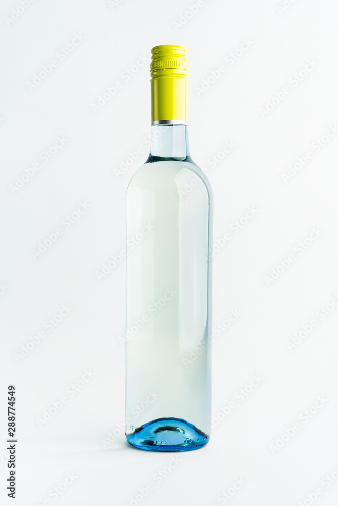 A bottle of white wine for the label layout on a light background ...