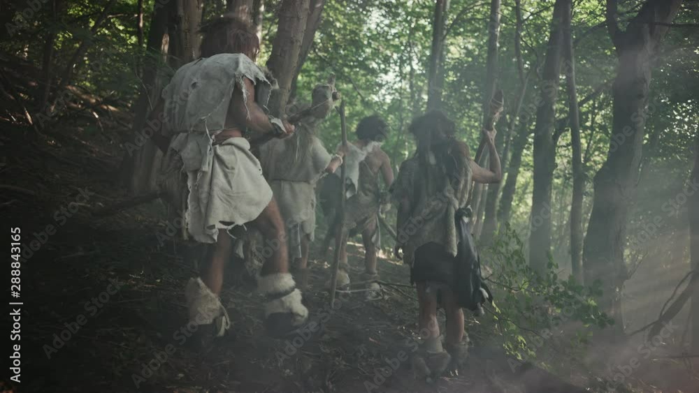 Tribe of Hunter-Gatherers Wearing Animal Skin Holding Stone Tipped ...