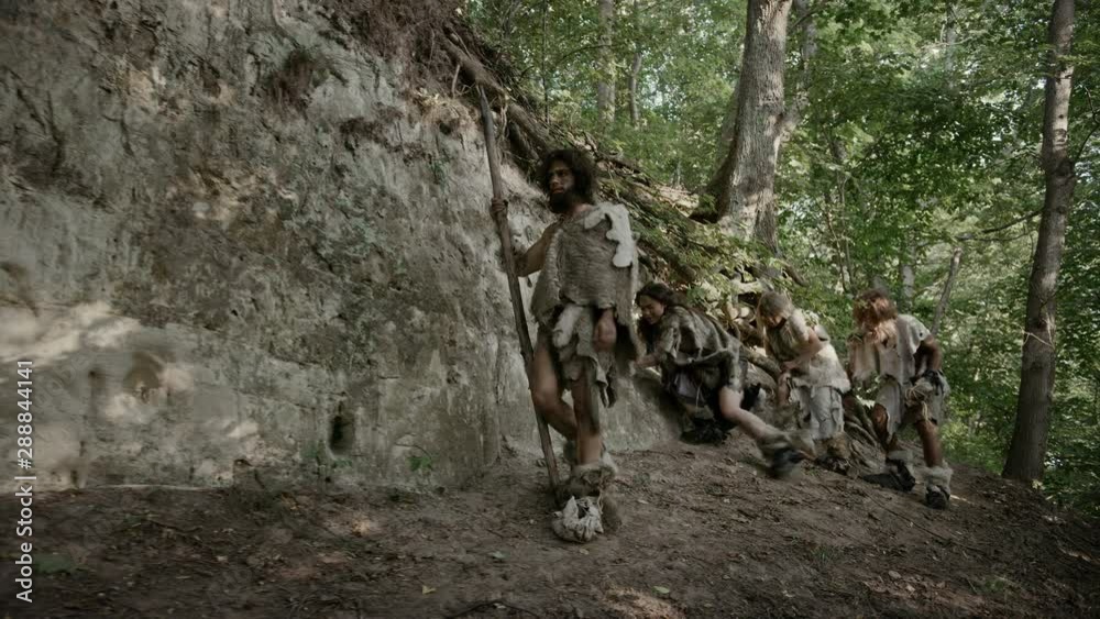 Tribe of Hunter-Gatherers Wearing Animal Skin Living in a Cave ...
