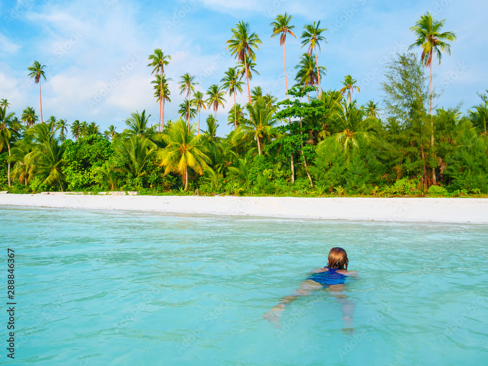 Woman swimming in caribbean sea turquoise transparent water. Tropical ...