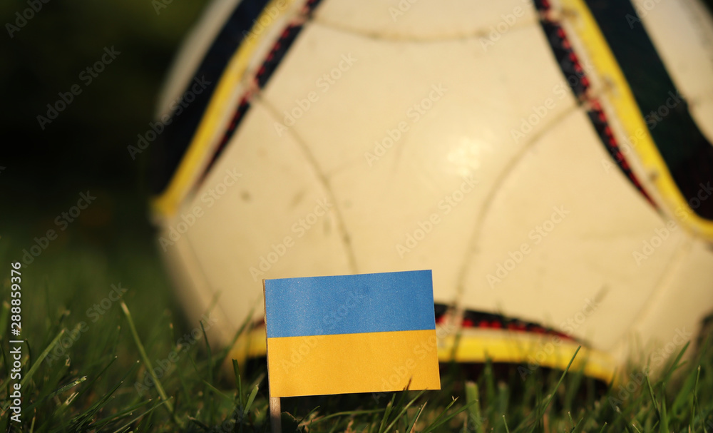 Flag of Ukraine made from blue and yellow square and in the backround ...