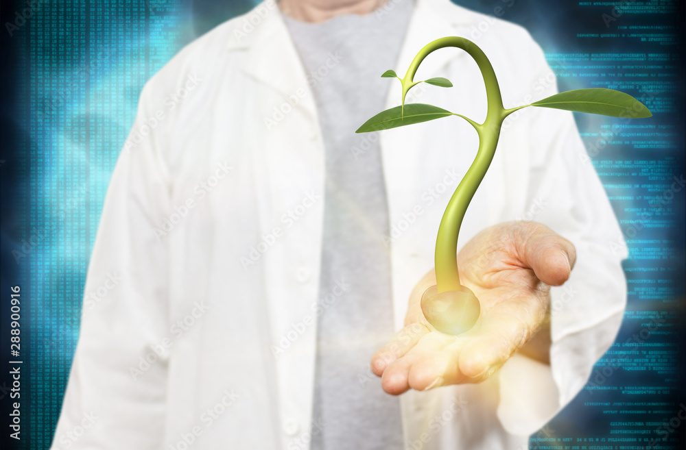 White scientist holding germinating seed on a blurred blue digital ...